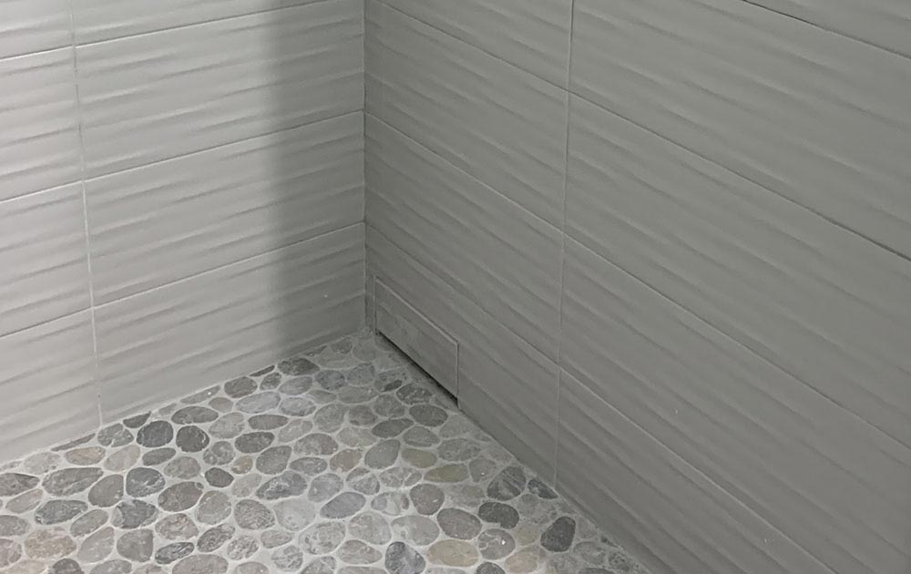 Invisible Drain = Invisidrain - The patented drain that's nearly invisible